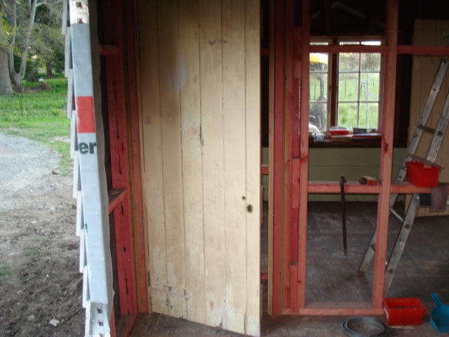 Reused Kauri Ledge & Brace Doors | Karamu Cottage