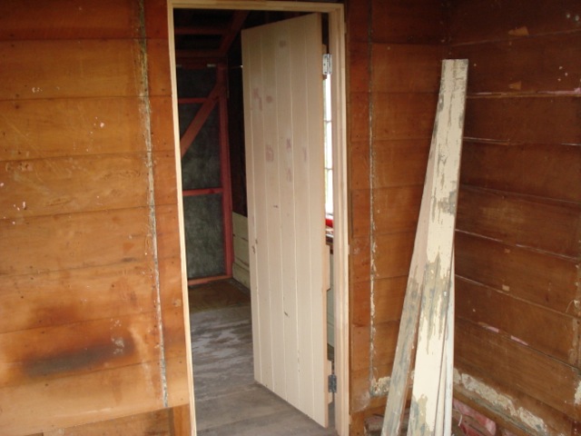 Reused Kauri Ledge & Brace Doors | Karamu Cottage